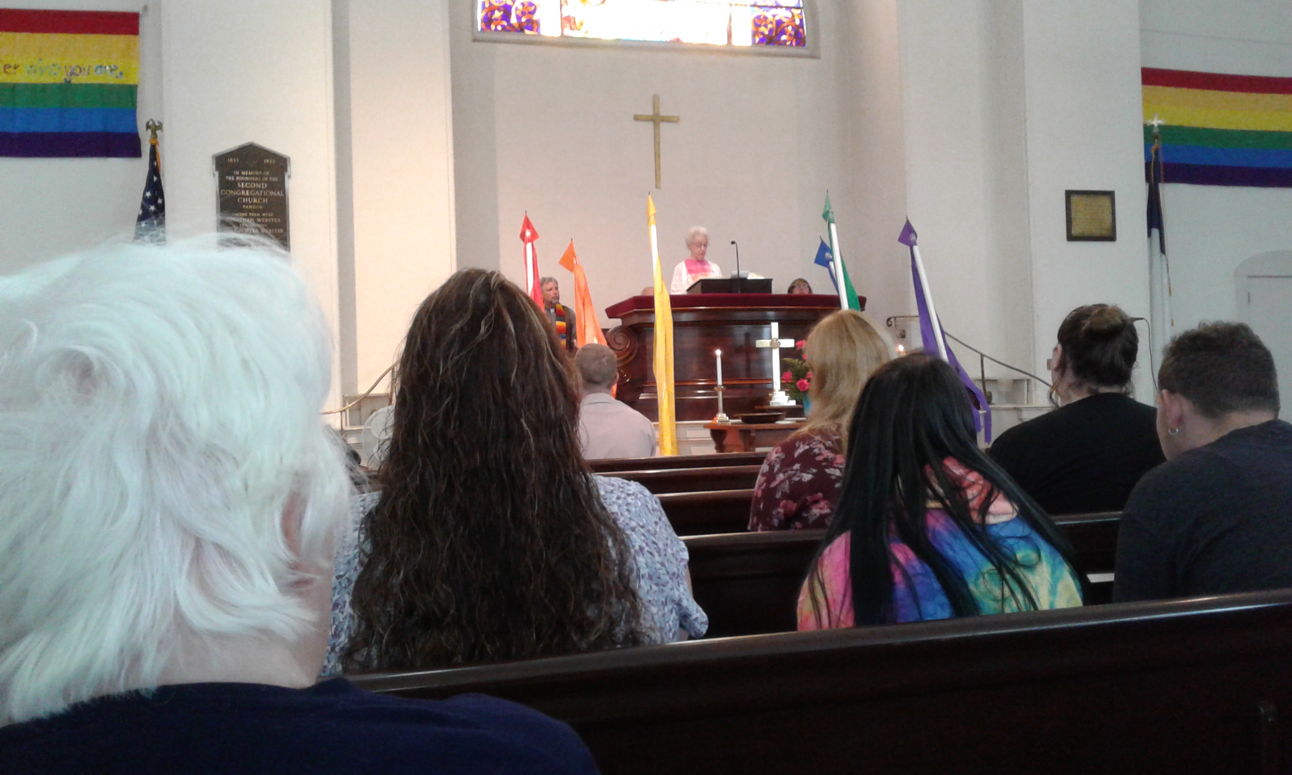 Eda and rainbow flags – Hammond Street Congregational Church